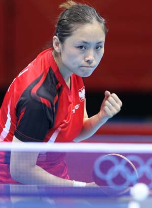 Li Qian Defeats Bronze Medallist but Singapore Recovers to Reach Last Eight